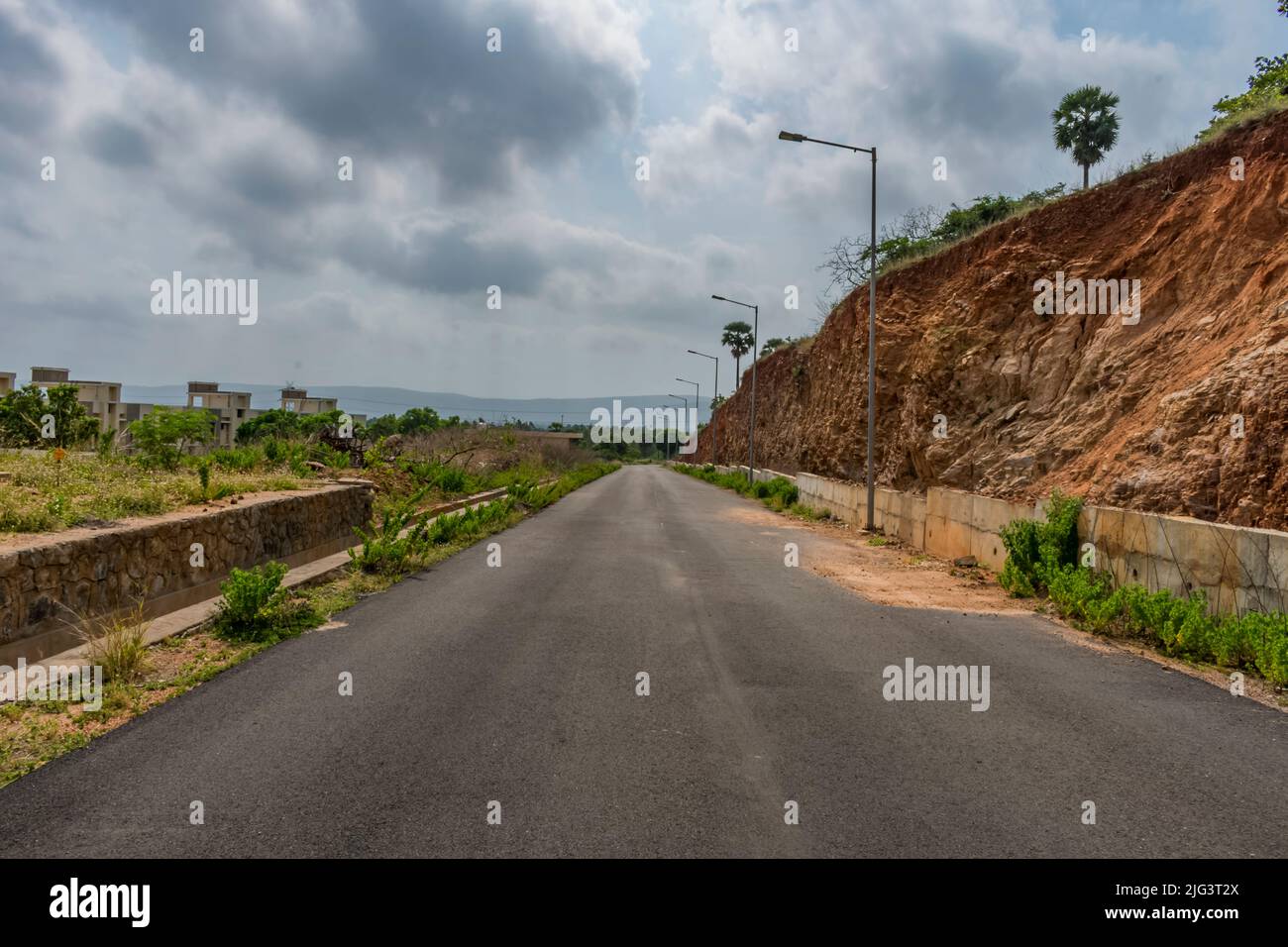 Awesome view of colony & blue sky scenery from a top of a mountain road ...