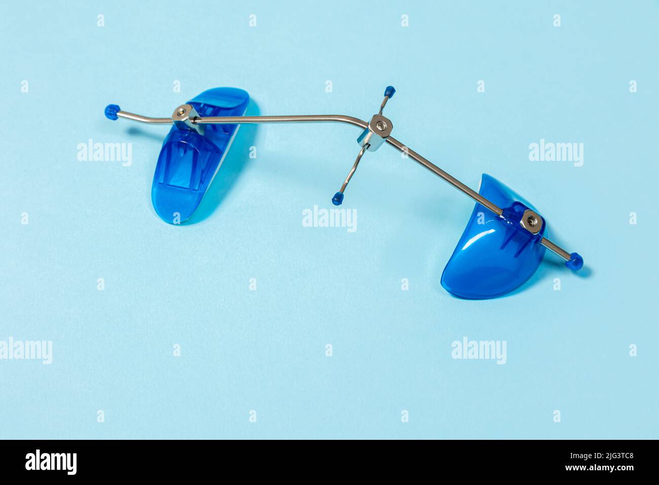 Orthodontic face mask Dental Petite Mask on a blue background special ...