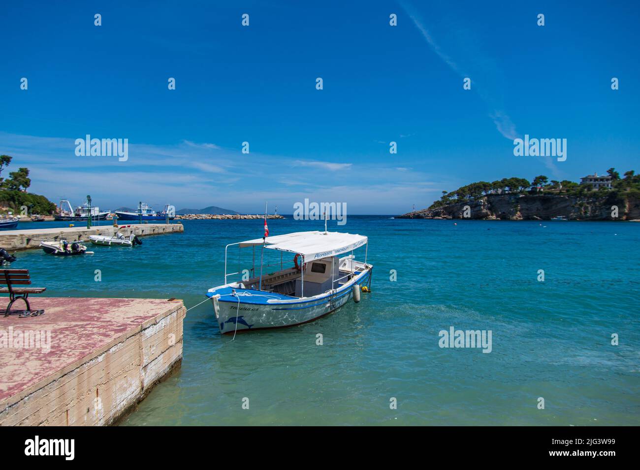 Traditional fishing boats at the picturesque port of Patitiri in ...
