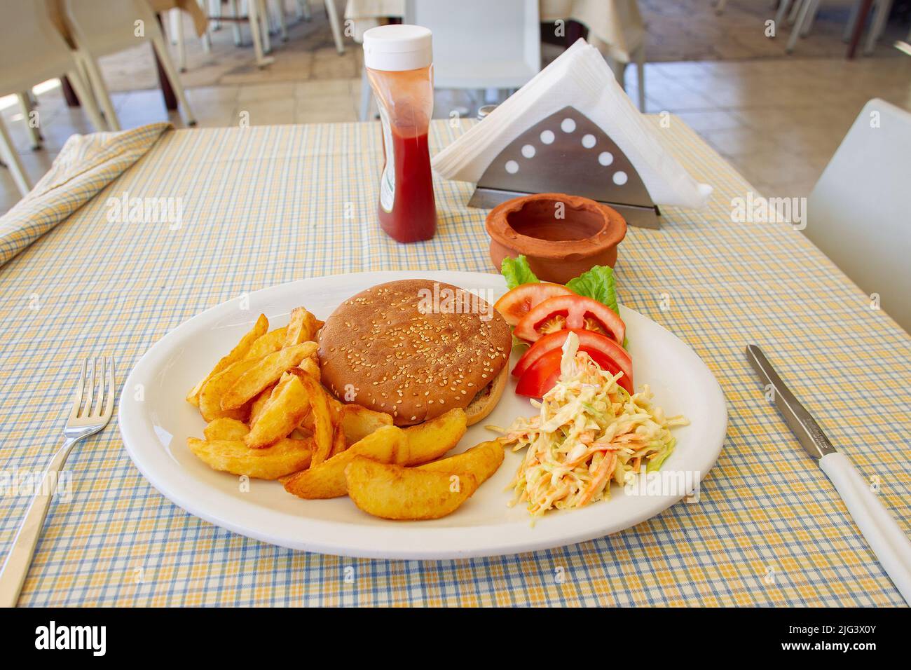 Popular in Cyprus - hamburger is a dish of hamburger, fried potatoes ...