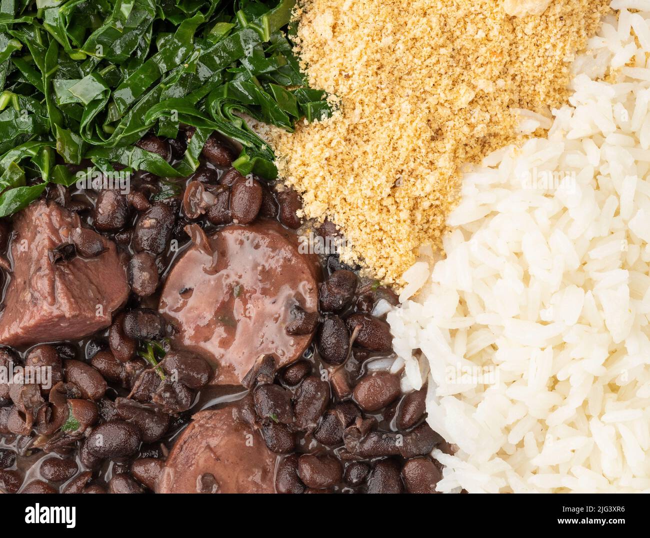 Closeup of typical brazilian feijoada with rice, farofa and kale Stock ...