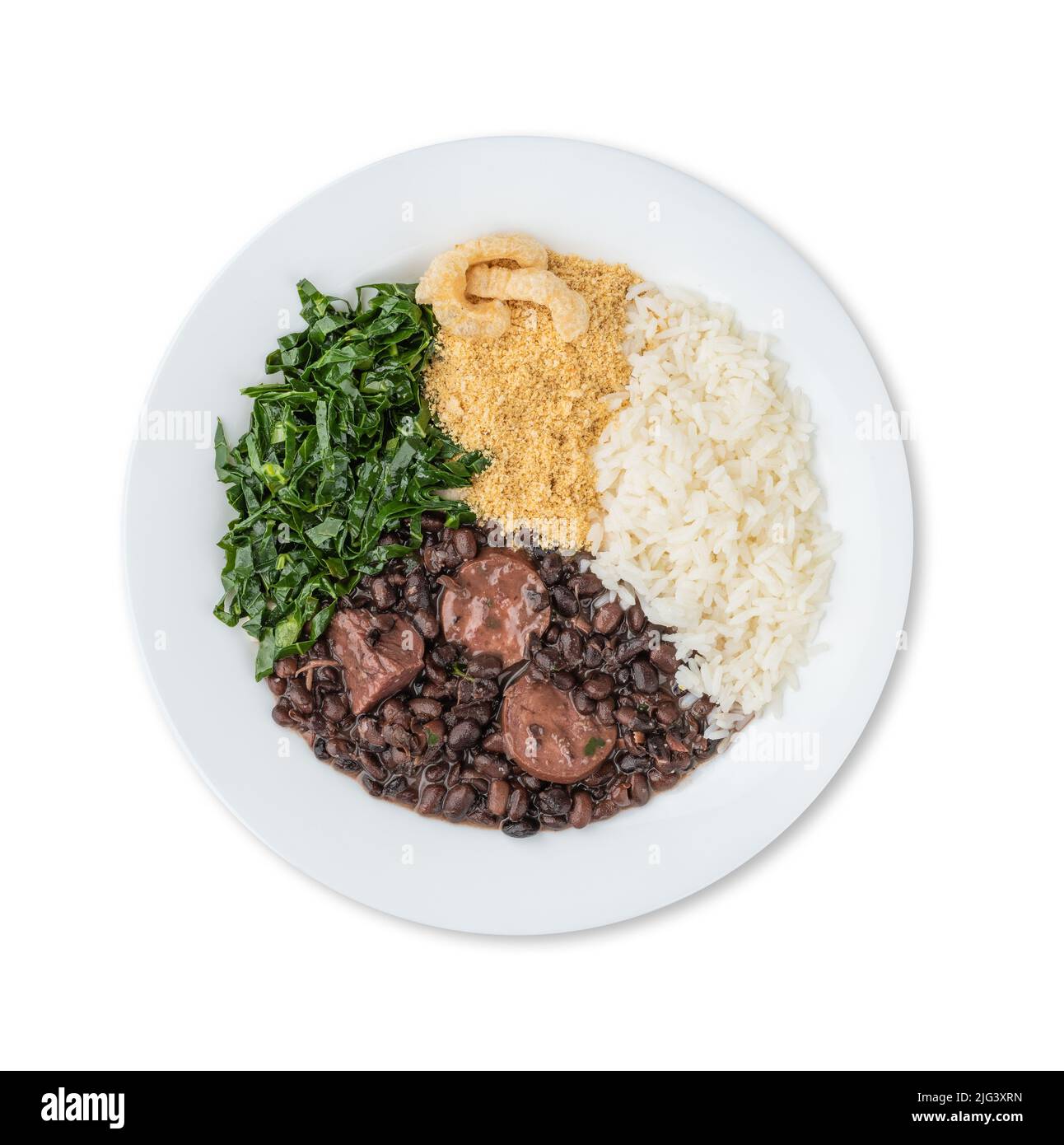 Typical brazilian feijoada with rice, farofa, kale and cracklings on a ...