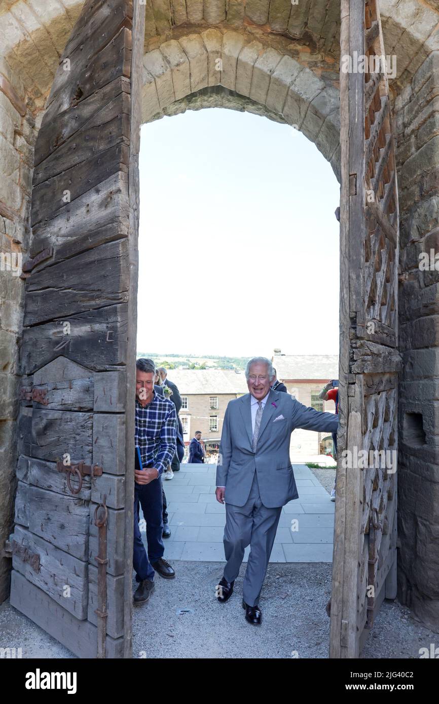 The Prince of Wales officially open Hay Castle by pushing open the ...