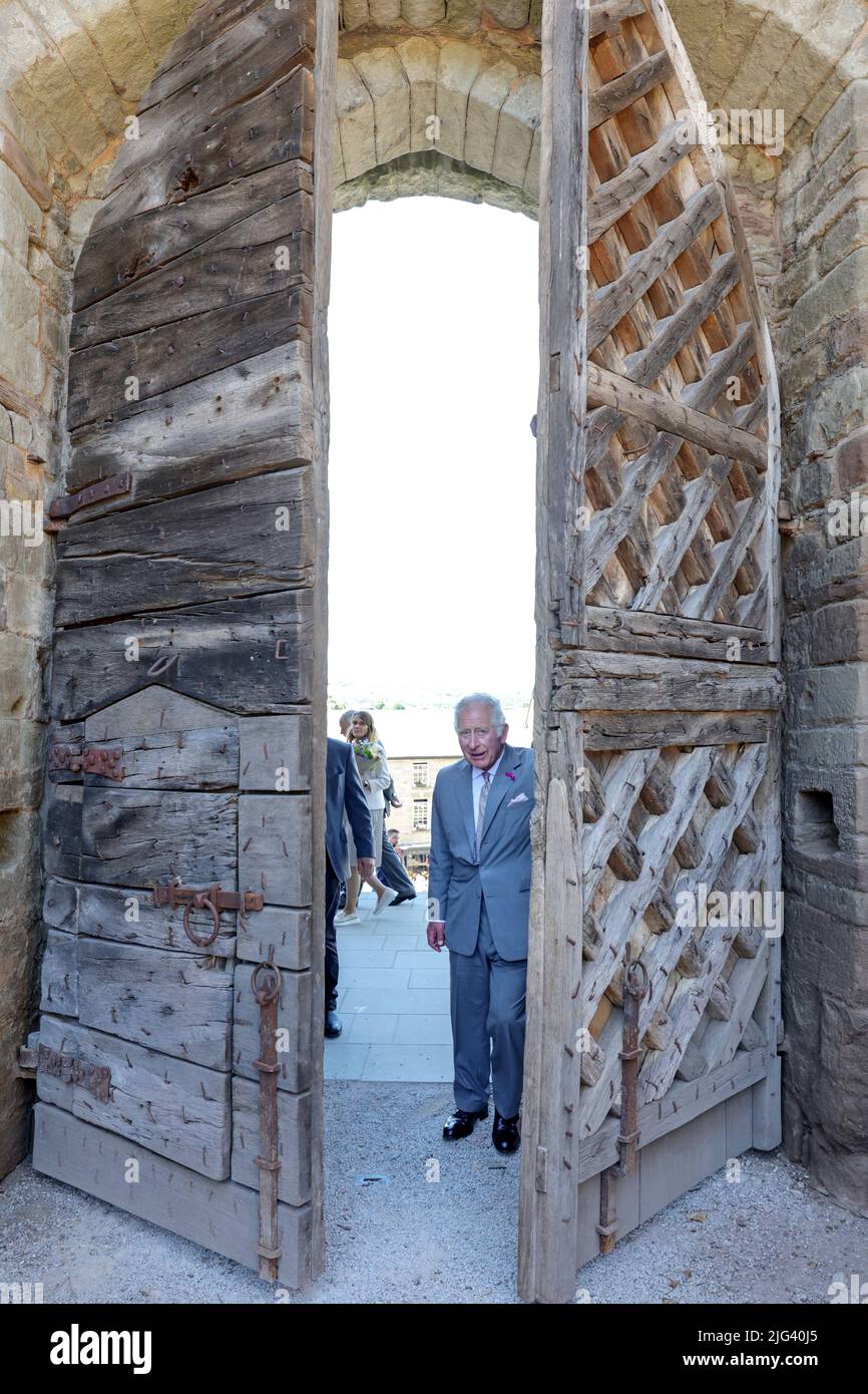 The Prince of Wales officially open Hay Castle by pushing open the ...