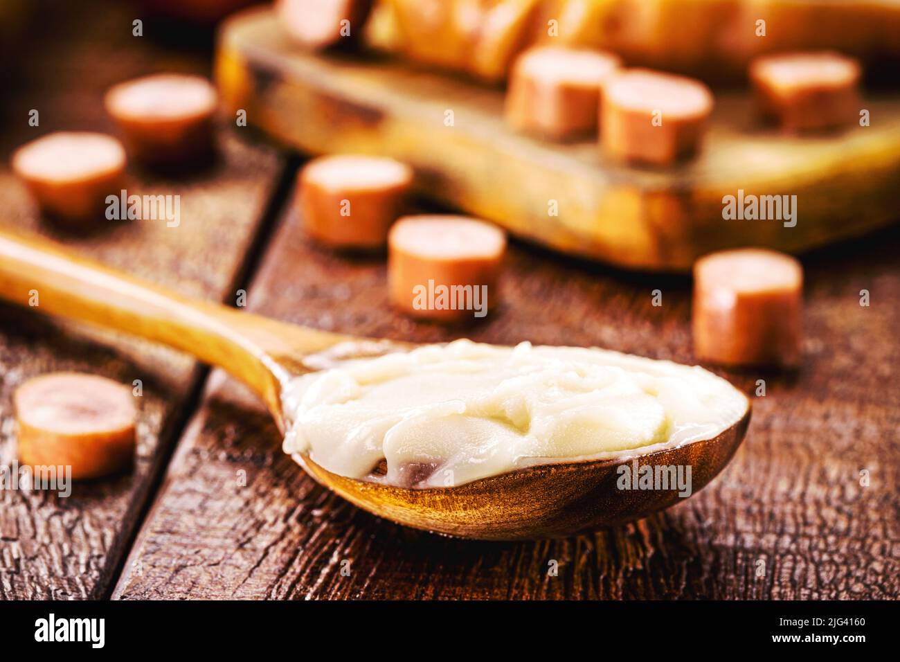 wooden spoon with lard, pork fat used as a cooking ingredient in brazil ...