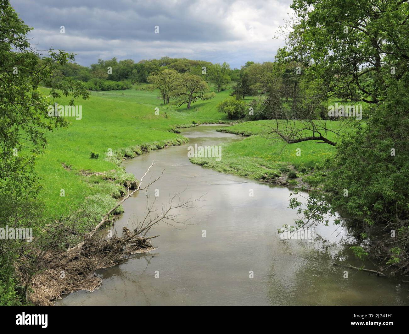 Streams winding through green grass hi-res stock photography and images ...