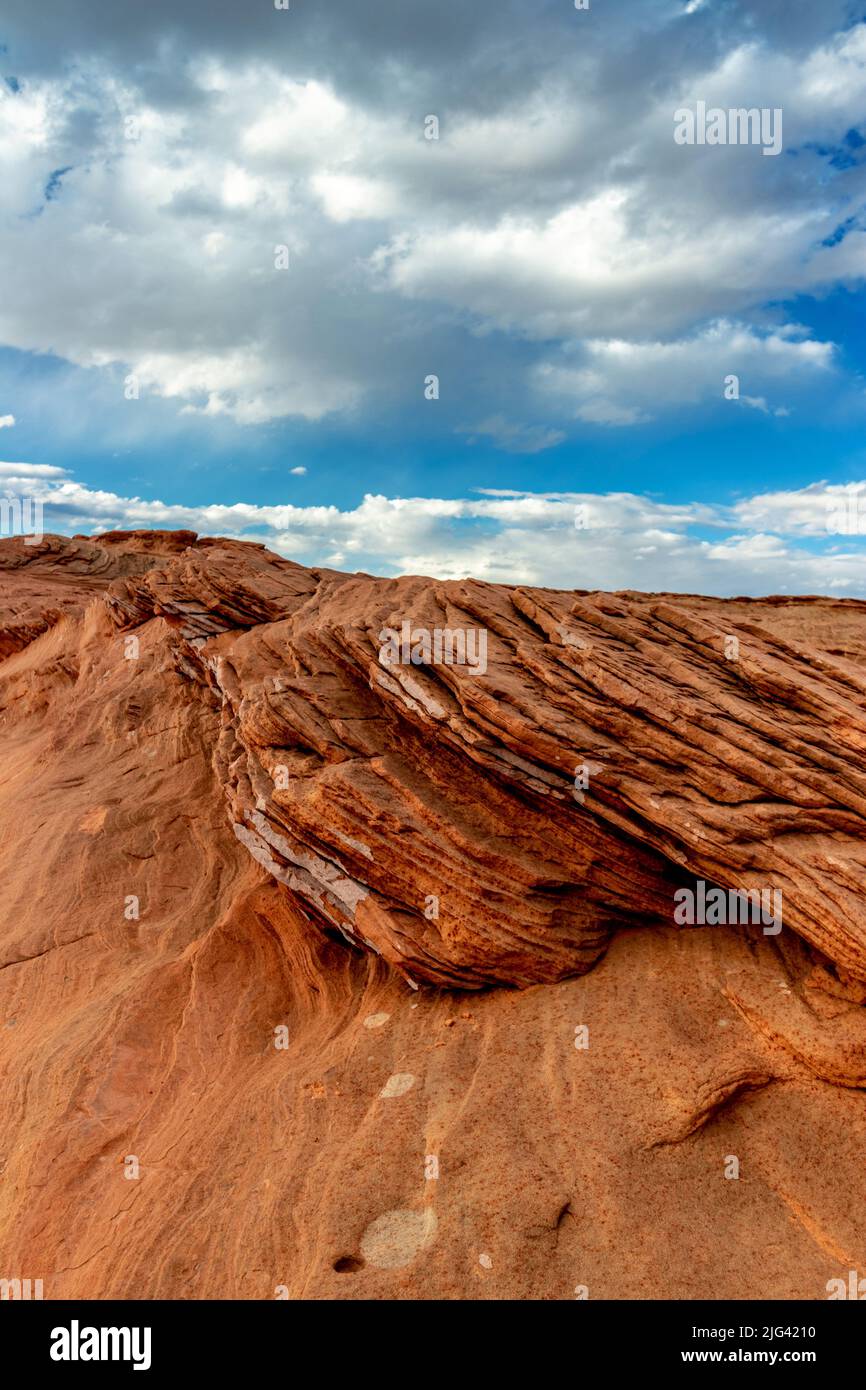 Rock layers that look like sand with folded patterns, The Chains, Page ...