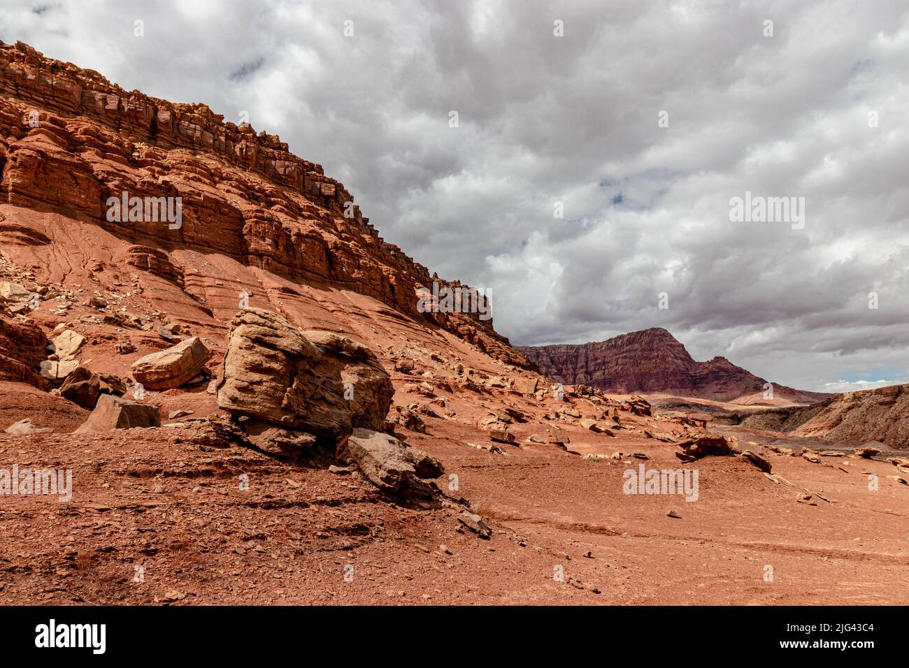 Boulders of various sizes strewn around the mountain over time ...