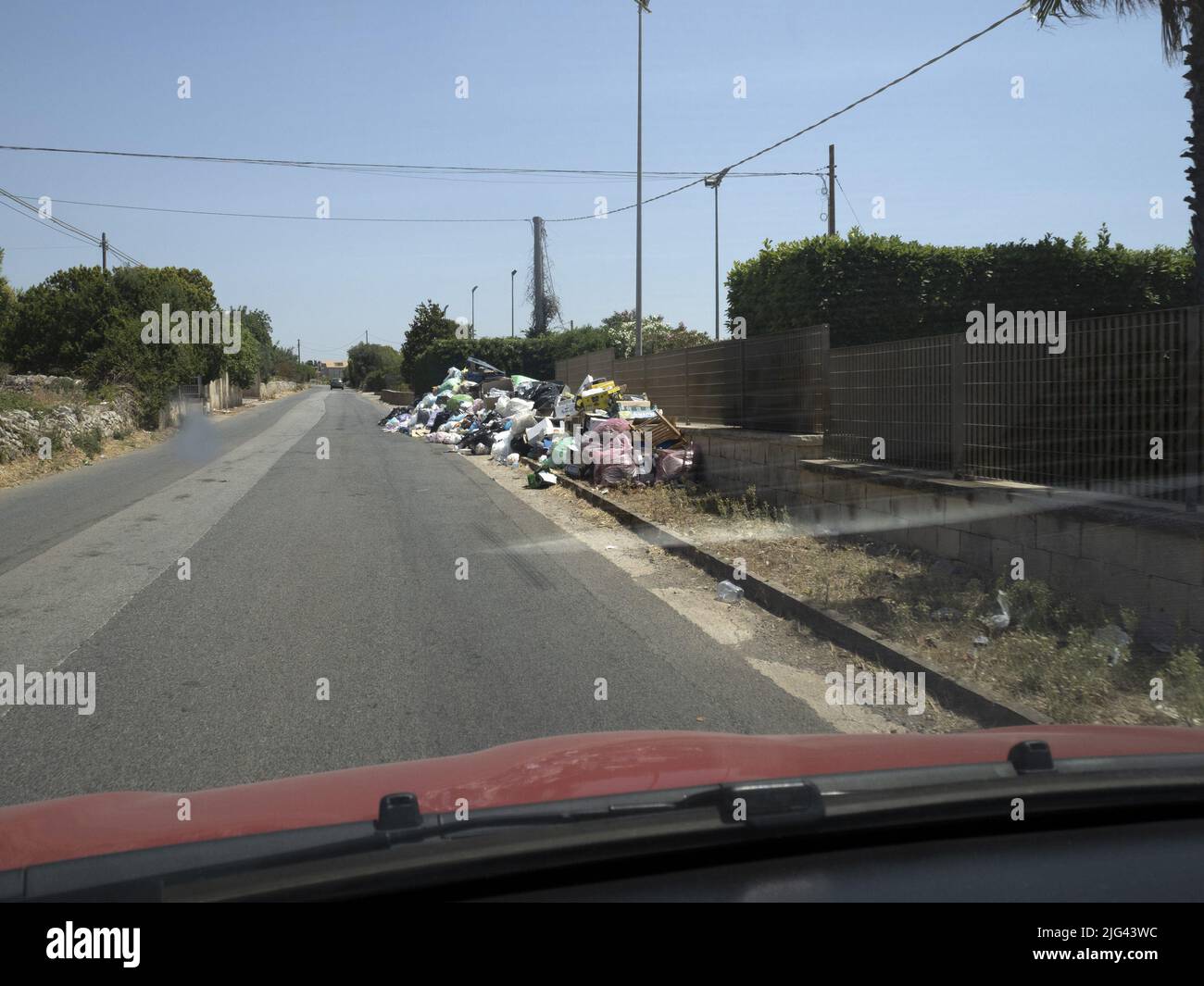 rubbish trash garbage in sicily road italy Stock Photo - Alamy