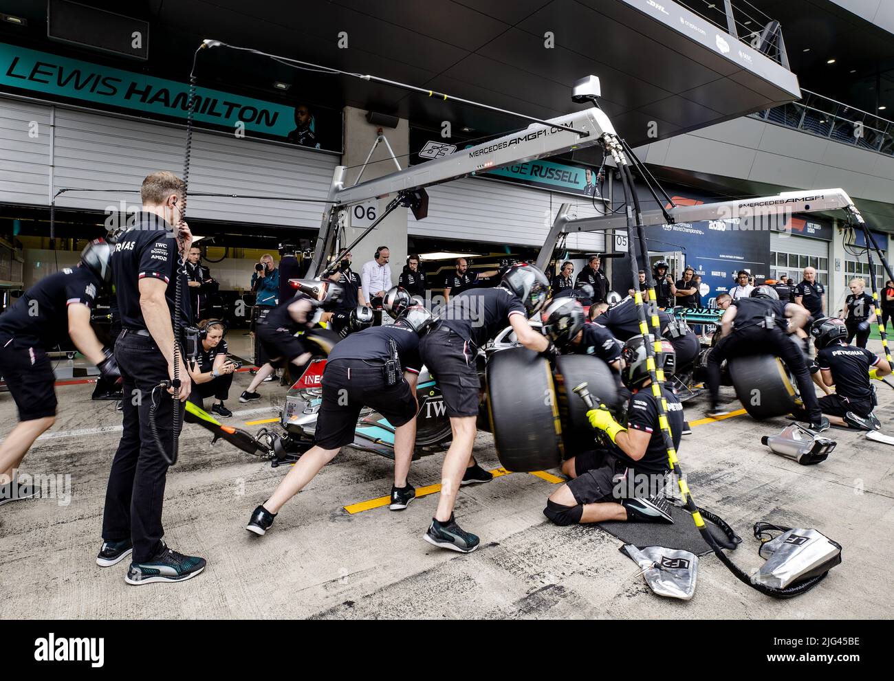 SPIELBERG - Mercedes engineers practice a pit stop in the pit lane on ...
