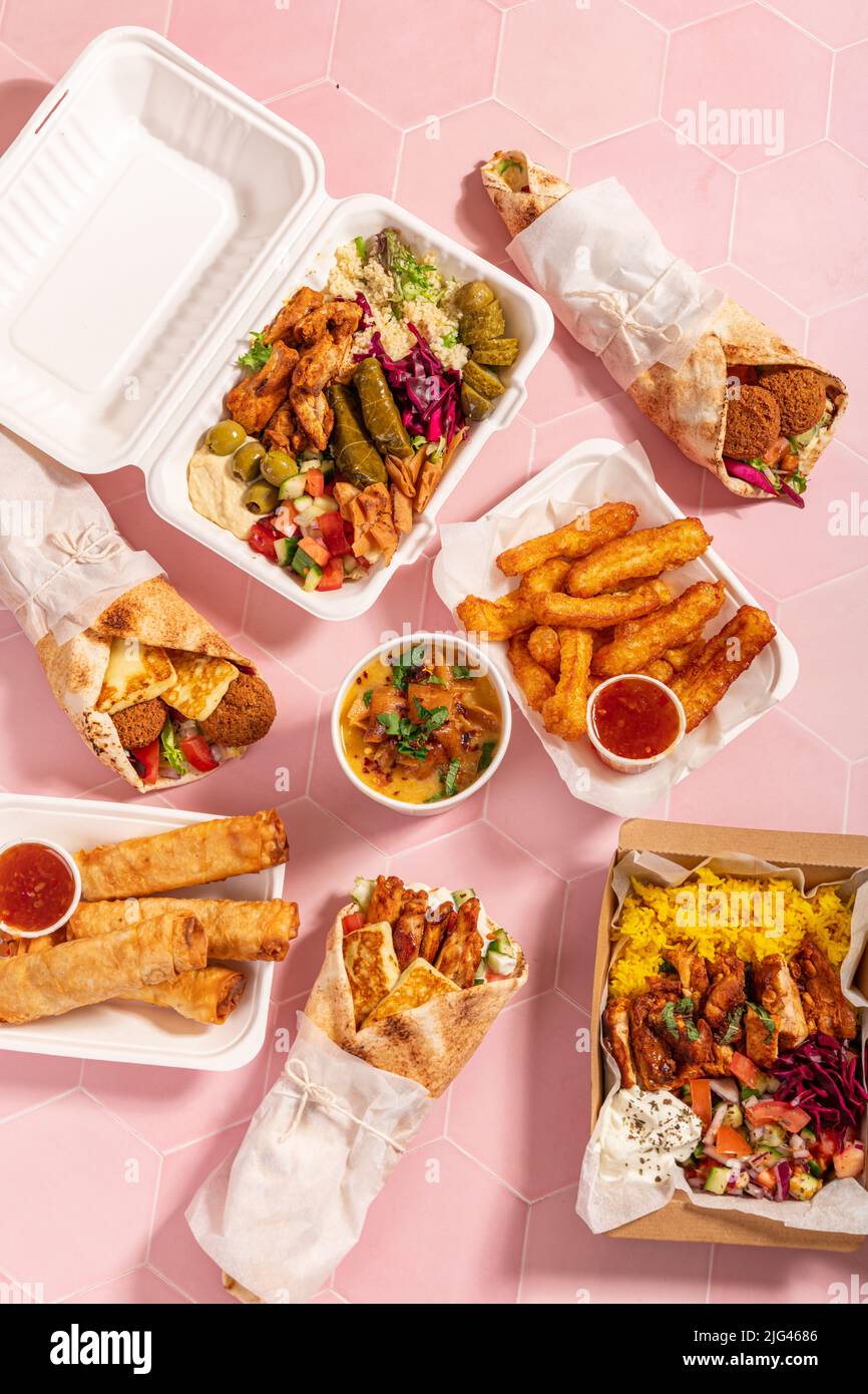 Variety of traditional takeaway Mediterranean Arabic meals for sharing ...