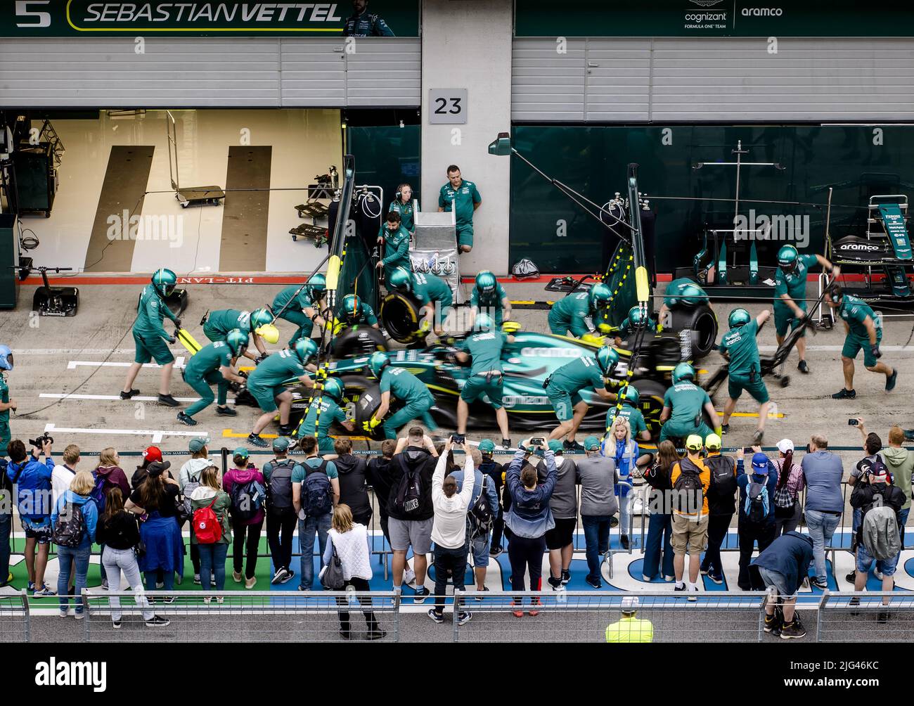 SPIELBERG - Aston Martin engineers practice a pit stop in the pit lane ...