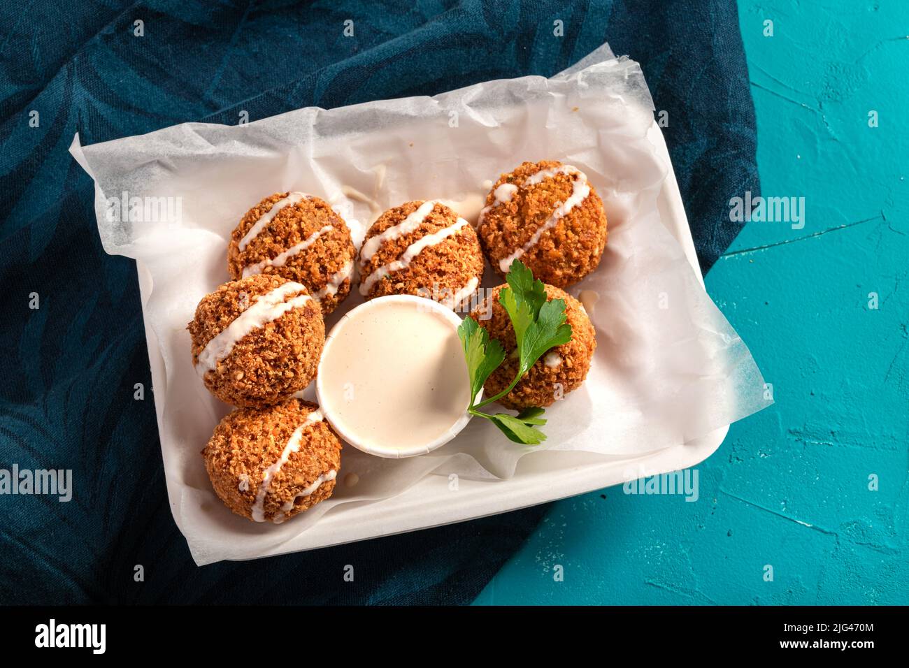 Traditional Mediterranean Arabic vegan falafel with a yoghurt and mayo ...