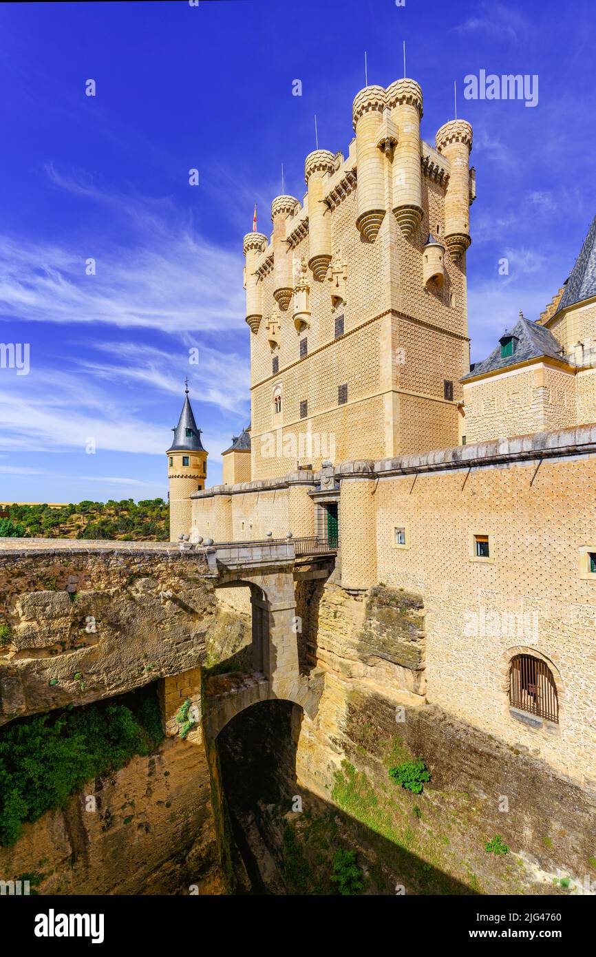 Medieval castle and defensive moat of the Alcazar of Segovia in Spain ...