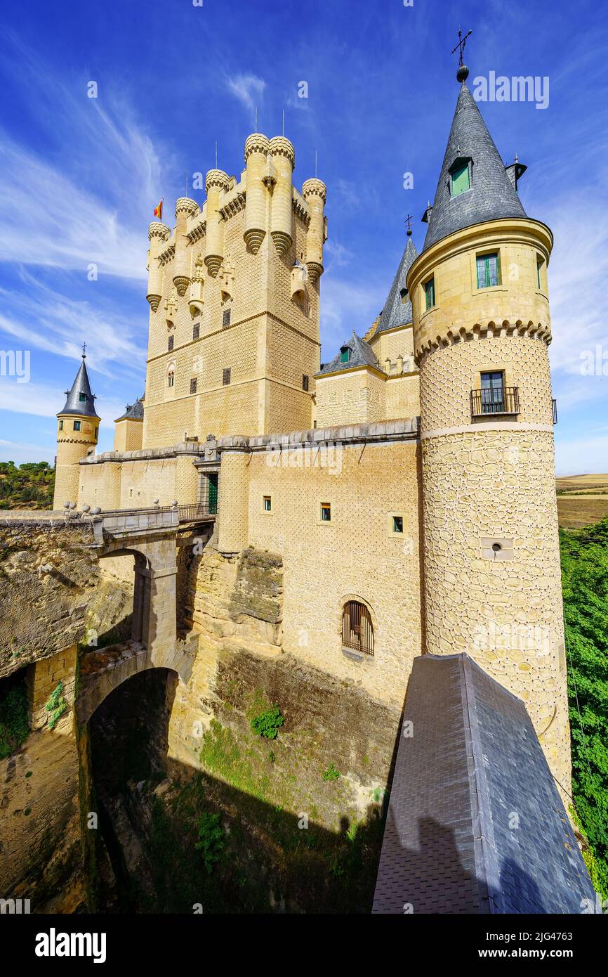 Medieval castle and defensive moat of the Alcazar of Segovia in Spain ...