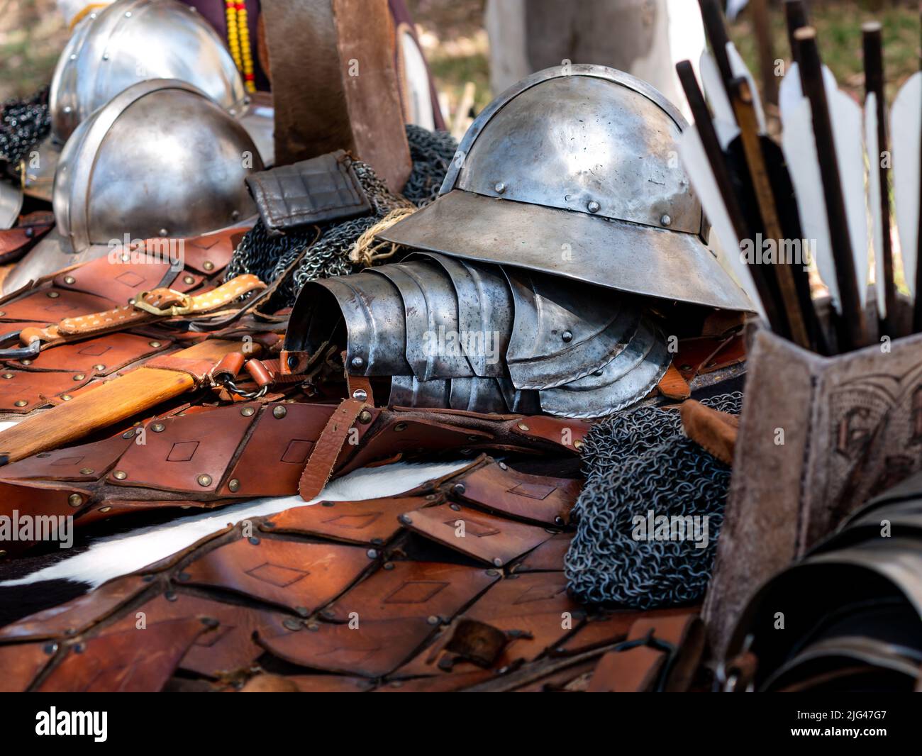 table with medieval soldier equipment on display Stock Photo - Alamy