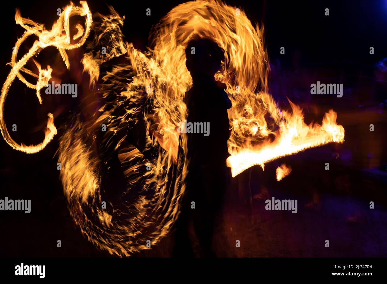 Texture of fire in dark. Fire show at night. Lines of flame. Details of ...
