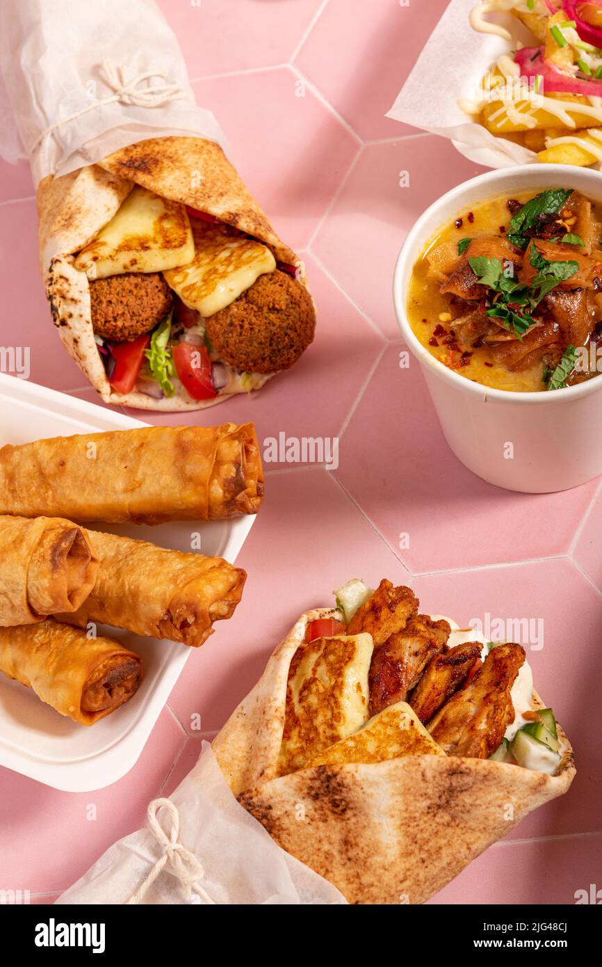 Variety of traditional takeaway Mediterranean Arabic meals for sharing ...