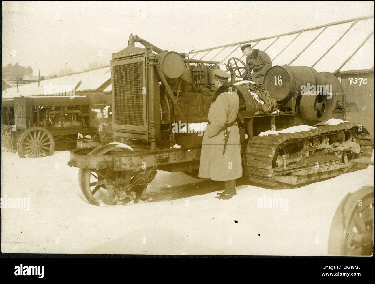 German troops on the advance in occupied Minsk. A captured Gaterpiller ...