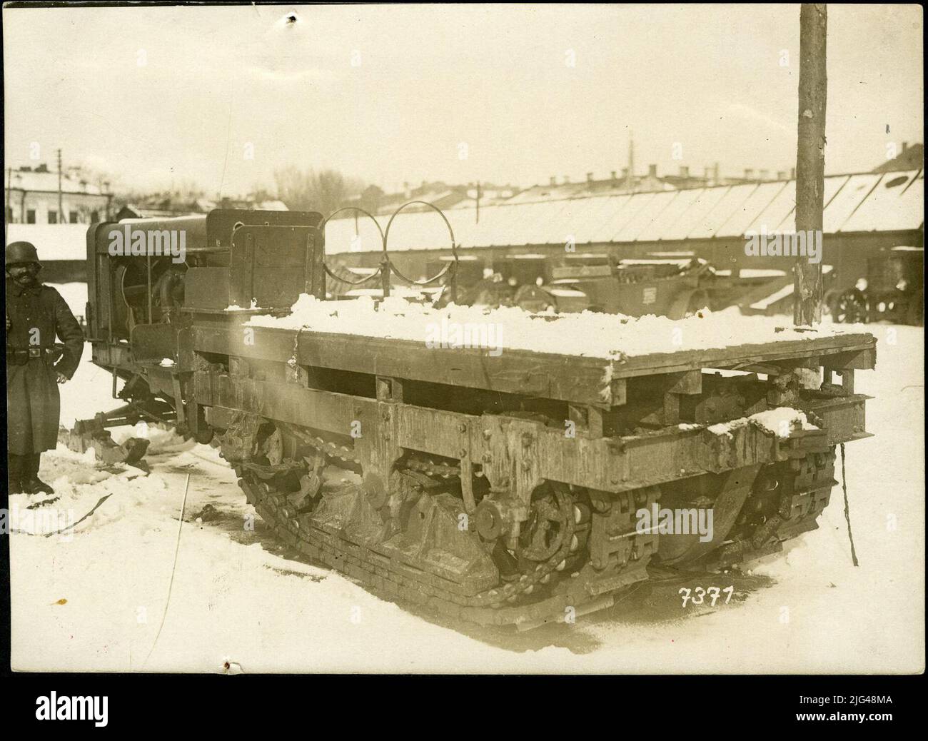 German troops on the advance in occupied Minsk. A captured tractor with ...
