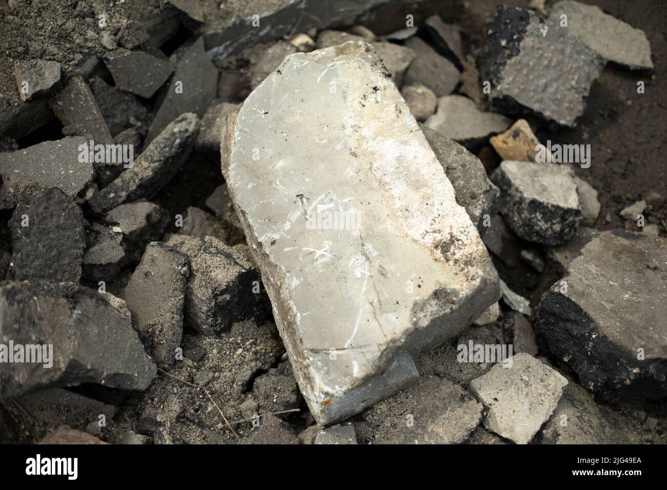 Broken concrete slabs. Lots of stones. Construction waste. Details of ...