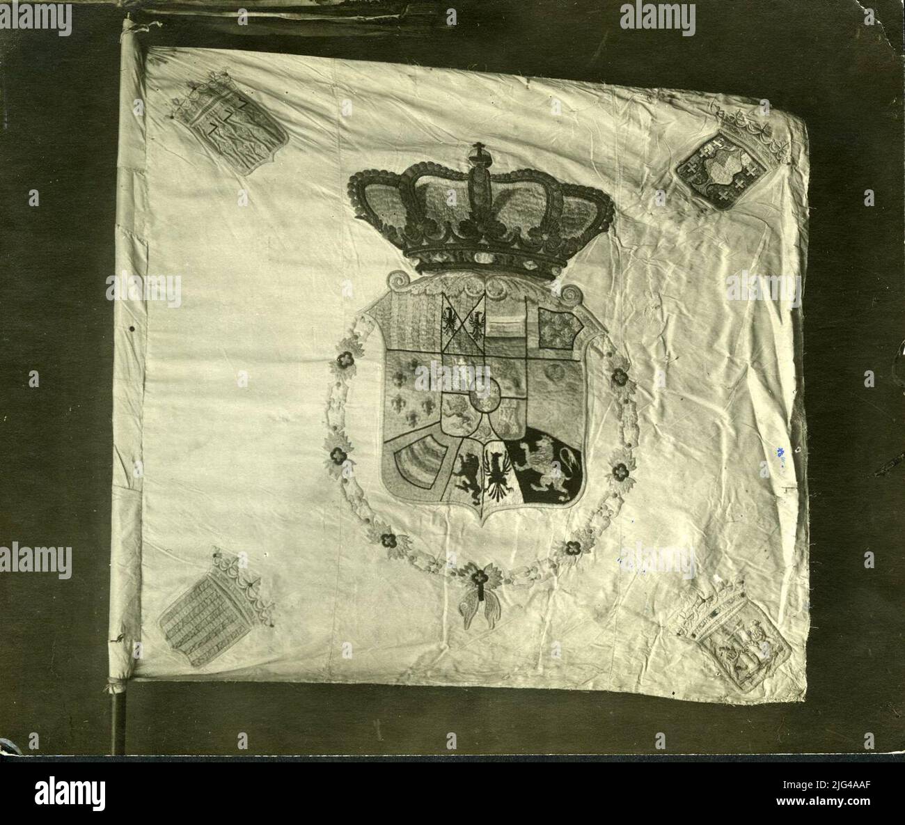 Flag photo, 1940. In the center, a real shield surrounded by the collar ...