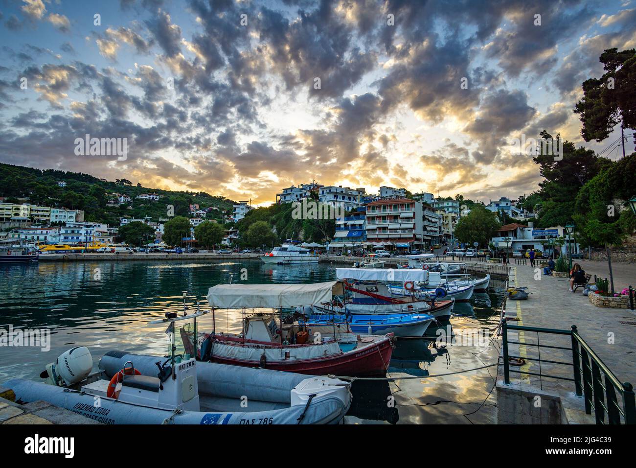 Traditional fishing boats at the picturesque port of Patitiri in ...