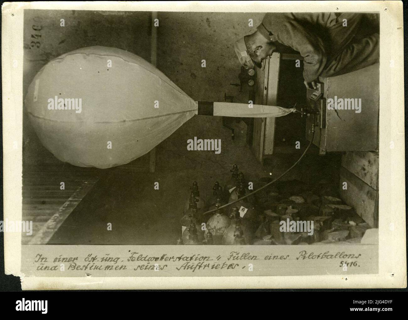In an east. Field weather station: Filling a pilot balloon. Determine ...