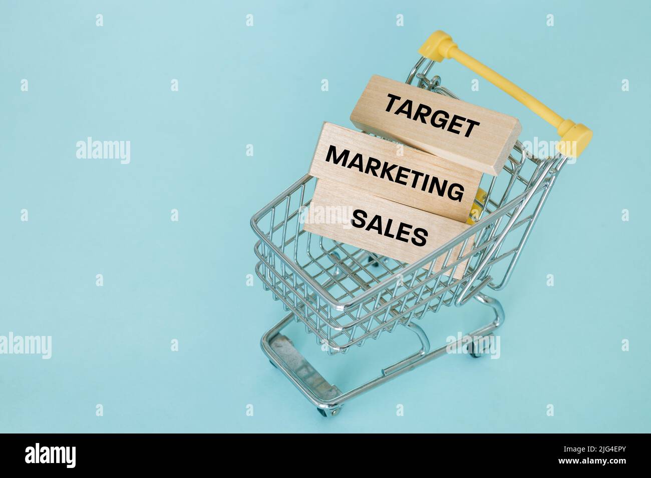 Wooden block miniature shopping cart with words Target, Marketing and ...
