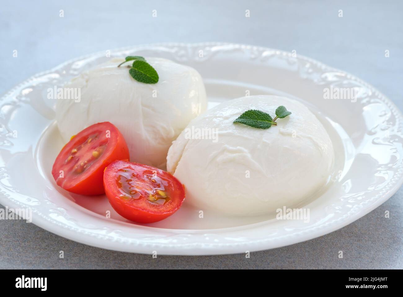 Traditional buffolo milk mozzarella cheese on the plate Stock Photo - Alamy
