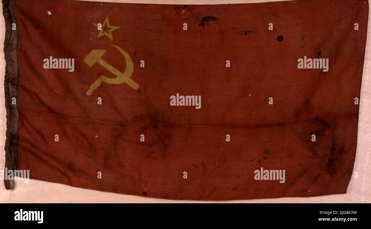 Flag. Flag. Of telilla stamped in red. The flag is rectangular and ...