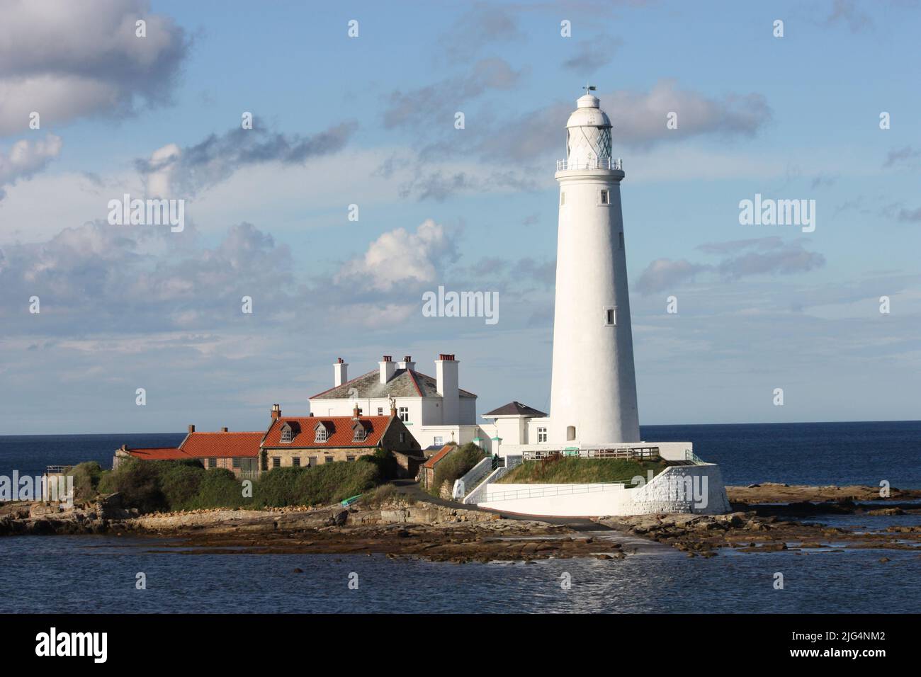 A White Island Lighthouse with Associated Buildings Stock Photo - Alamy