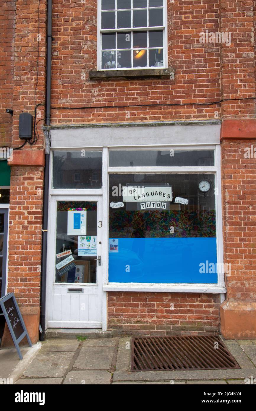 CREDITON, DEVON, UK - APRIL 6, 2022 DP. Languages tutor shop front on ...