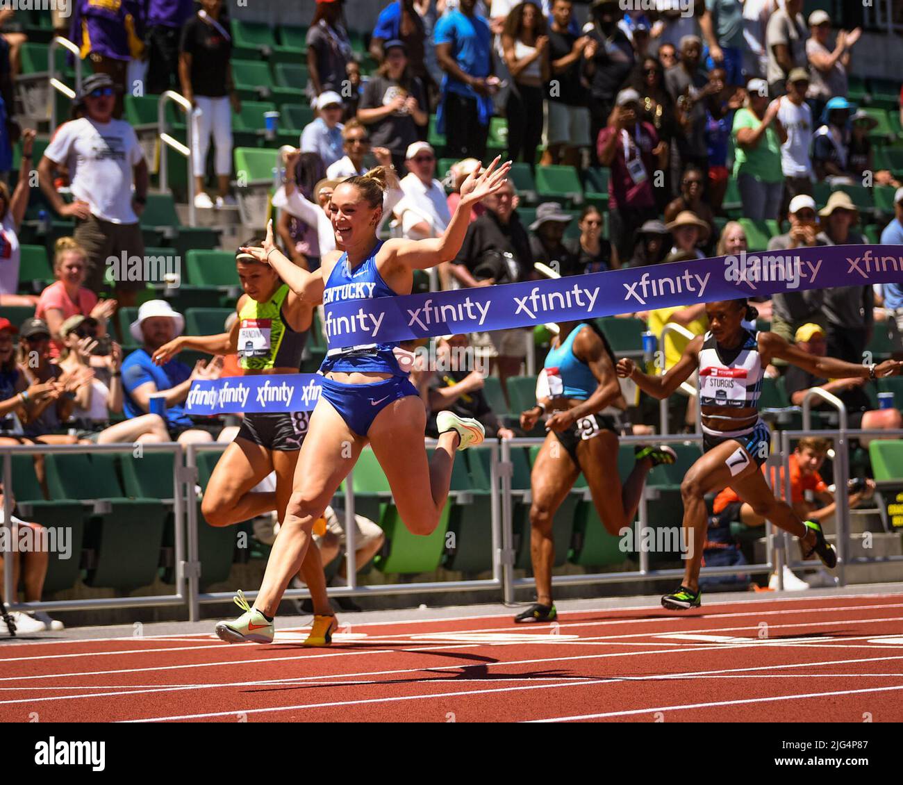 Abby Steiner cruises through the finish line of the Xfinity women’s ...