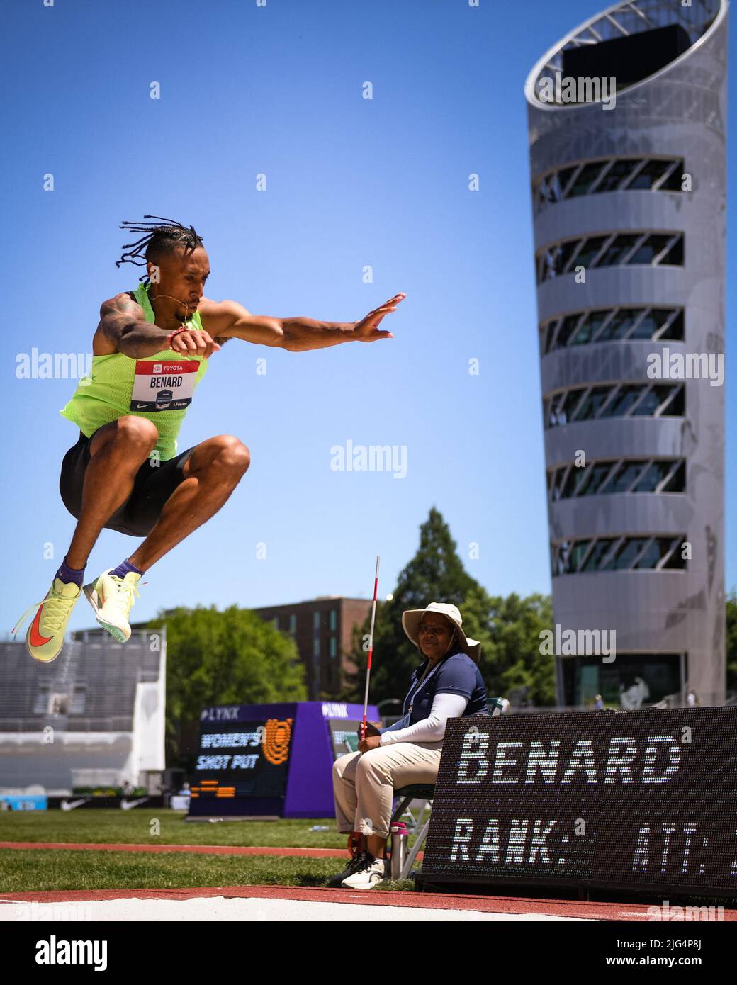 Chris Benard takes flight in his third attempt in the triple jump at ...