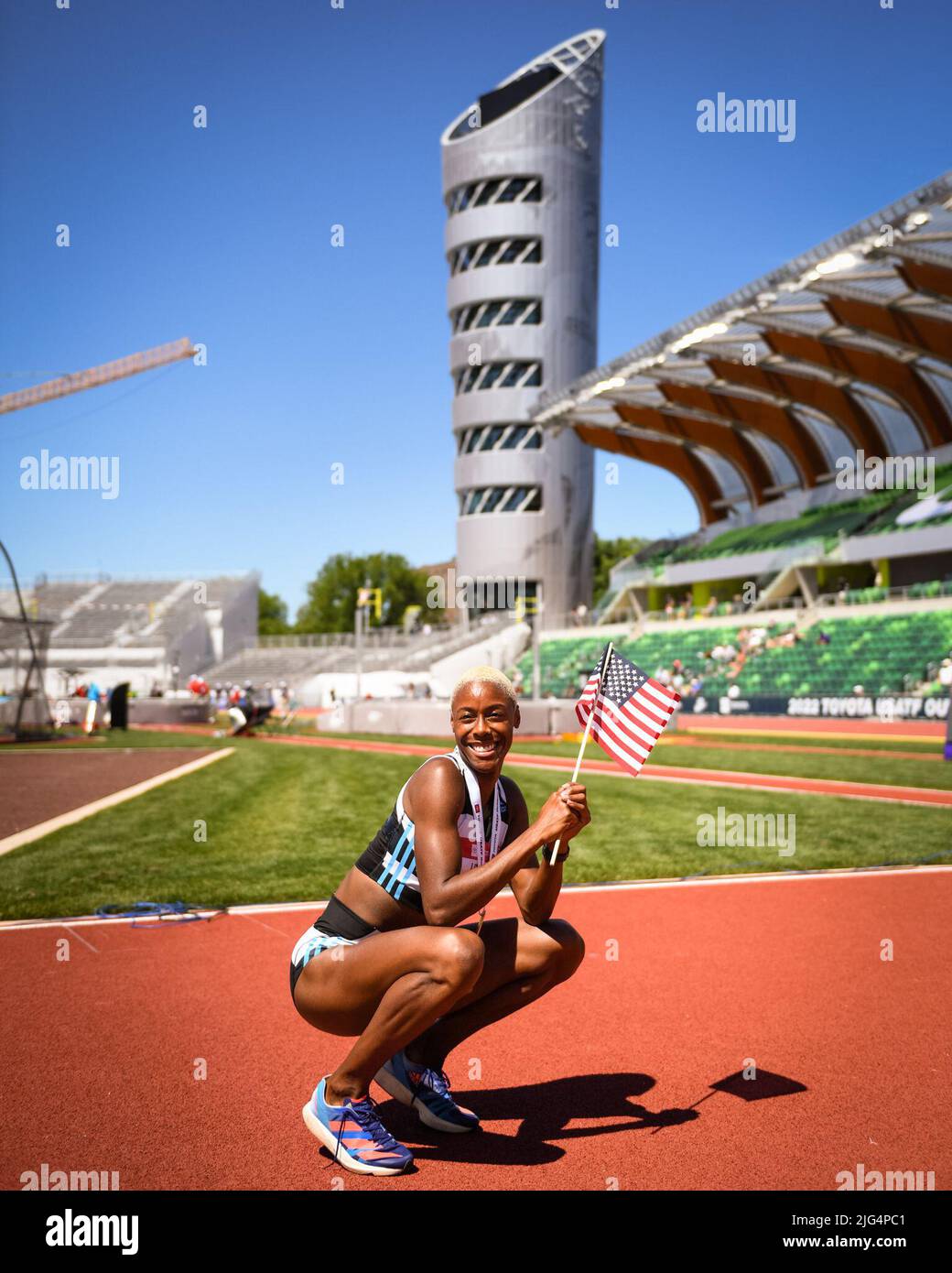 Shamier Little awaits the Xfinity women’s 400m hurdles podium ceremony ...