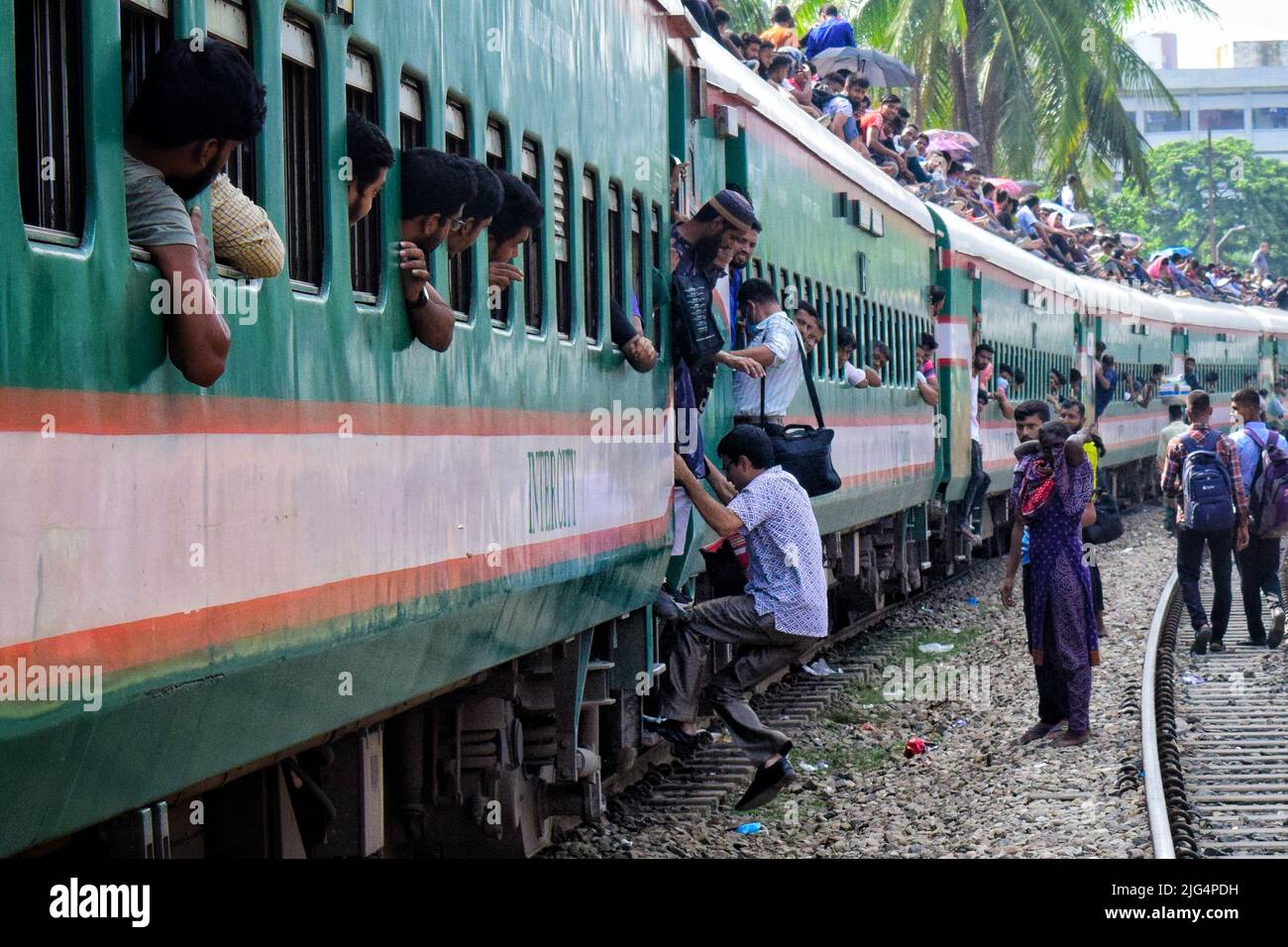 People climbing on roof train hi-res stock photography and images - Alamy