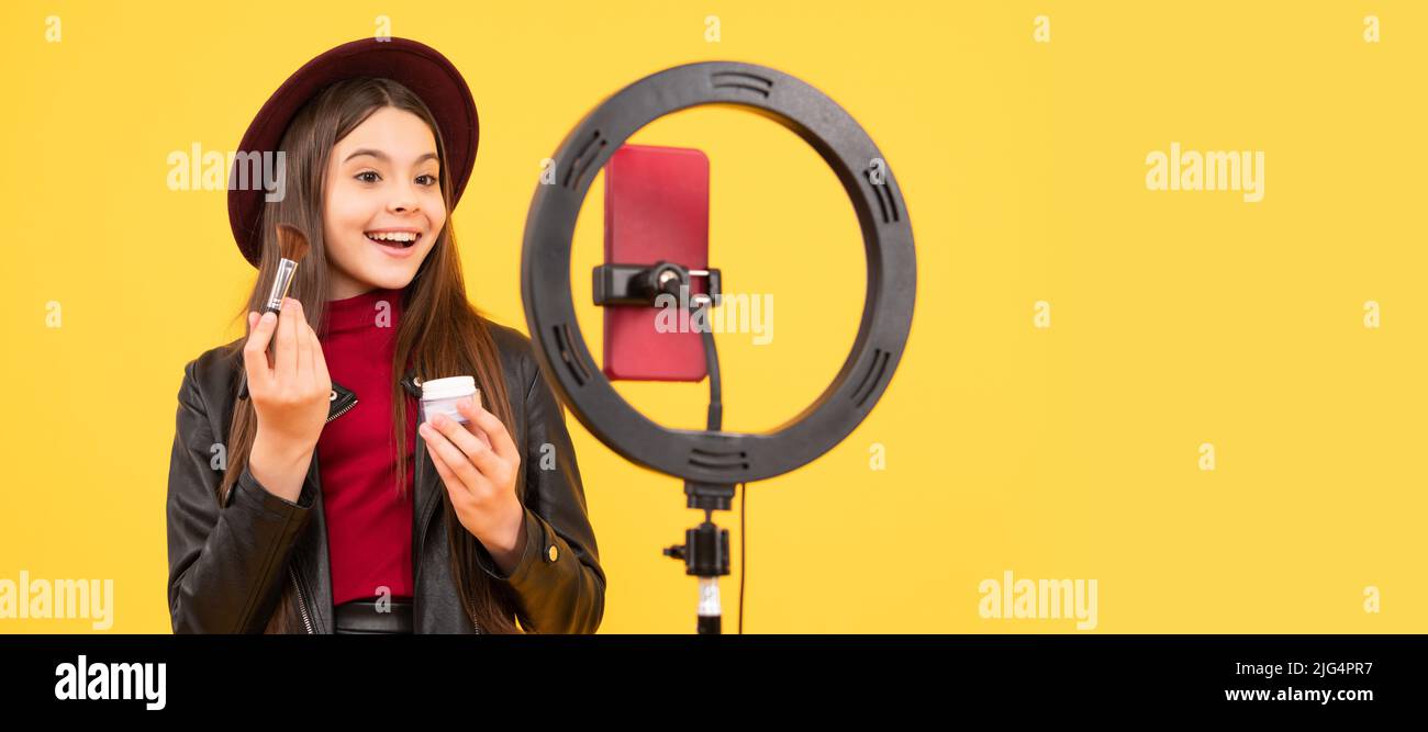 makeup tutorial. influencer. teen girl use selfie led. kid beauty ...