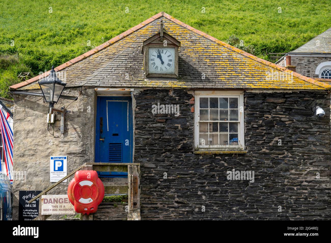 Quaint harbour building in the pretty coastal village of Port Isaac ...
