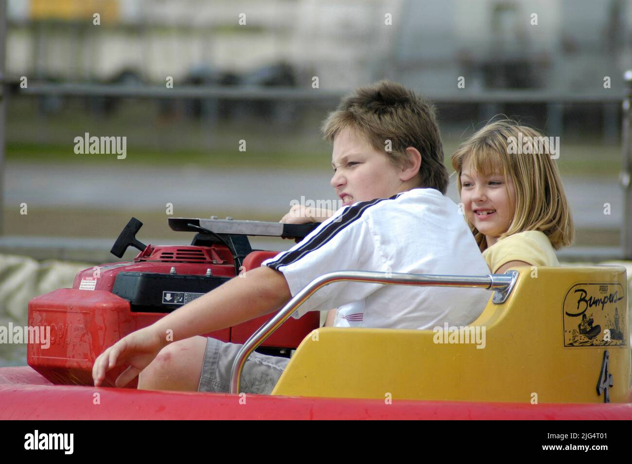 People on local carnival rides for fun during summer vacations at ...