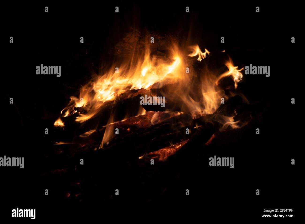 Bonfire in dark. Flames at night. Burning wood. Camping details. Flame ...