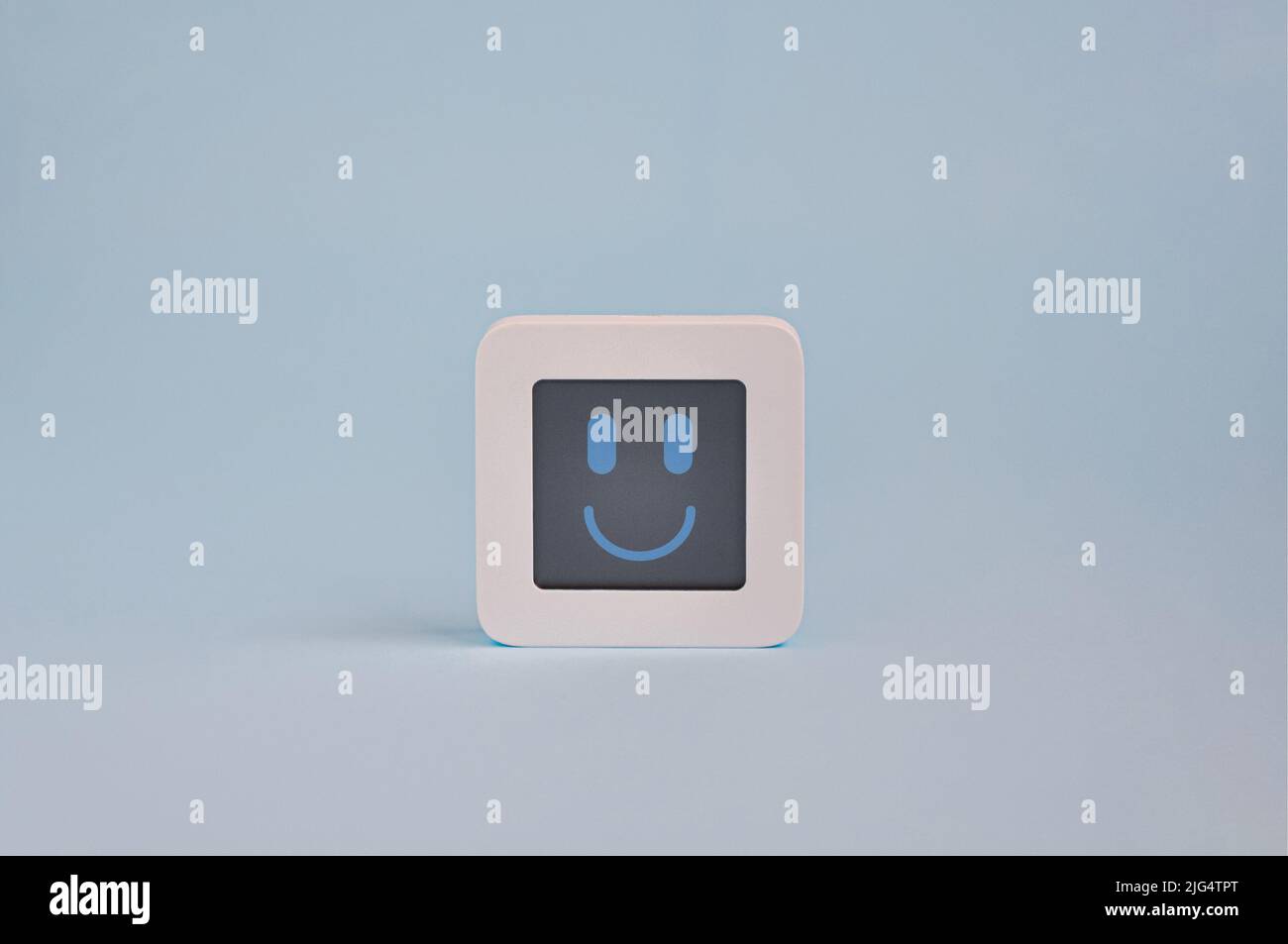 Happy emotion concept, symbol of smiley emoticon on lcd display ...