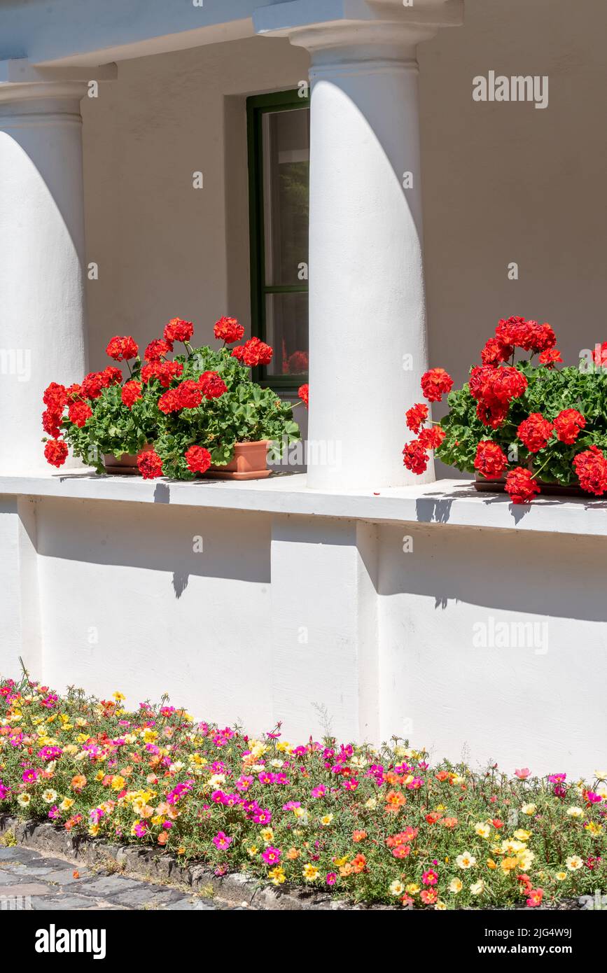 The covered exterior part of a village house or larger building at the ...