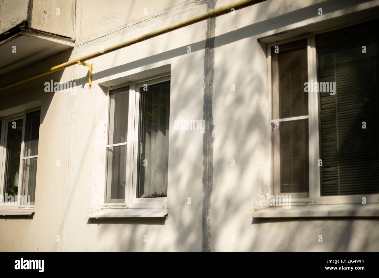 Building with windows. Urban development. Lots of apartment building ...