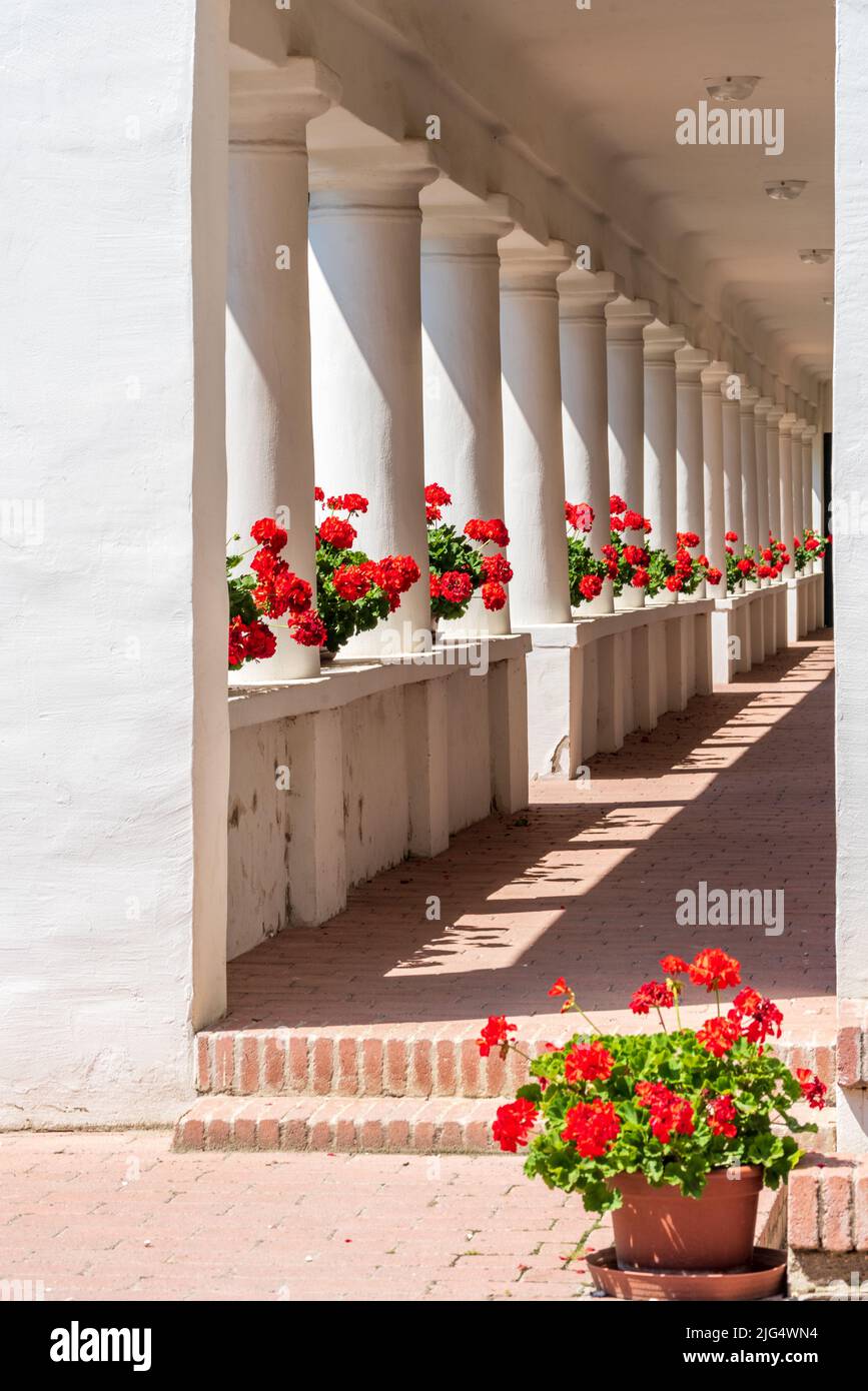 The covered exterior part of a village house or larger building at the ...