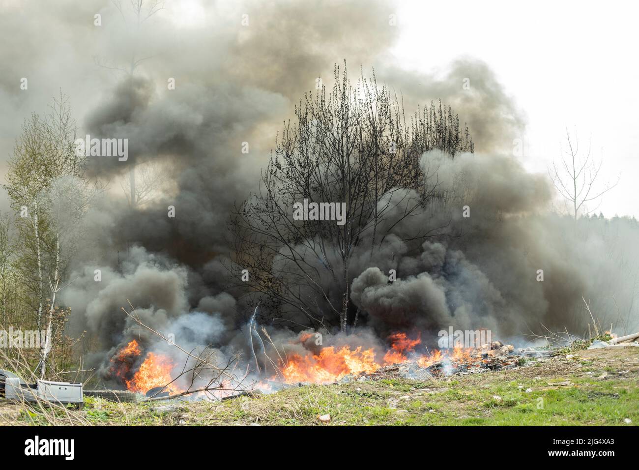 Fire in countryside. Black smoke and fire. It's eastern situation ...