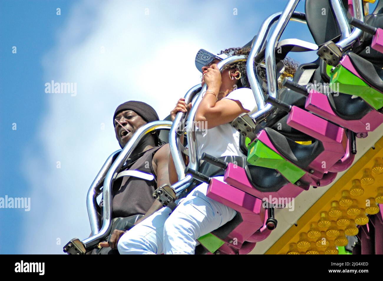 People on local carnival rides for fun during summer vacations at ...