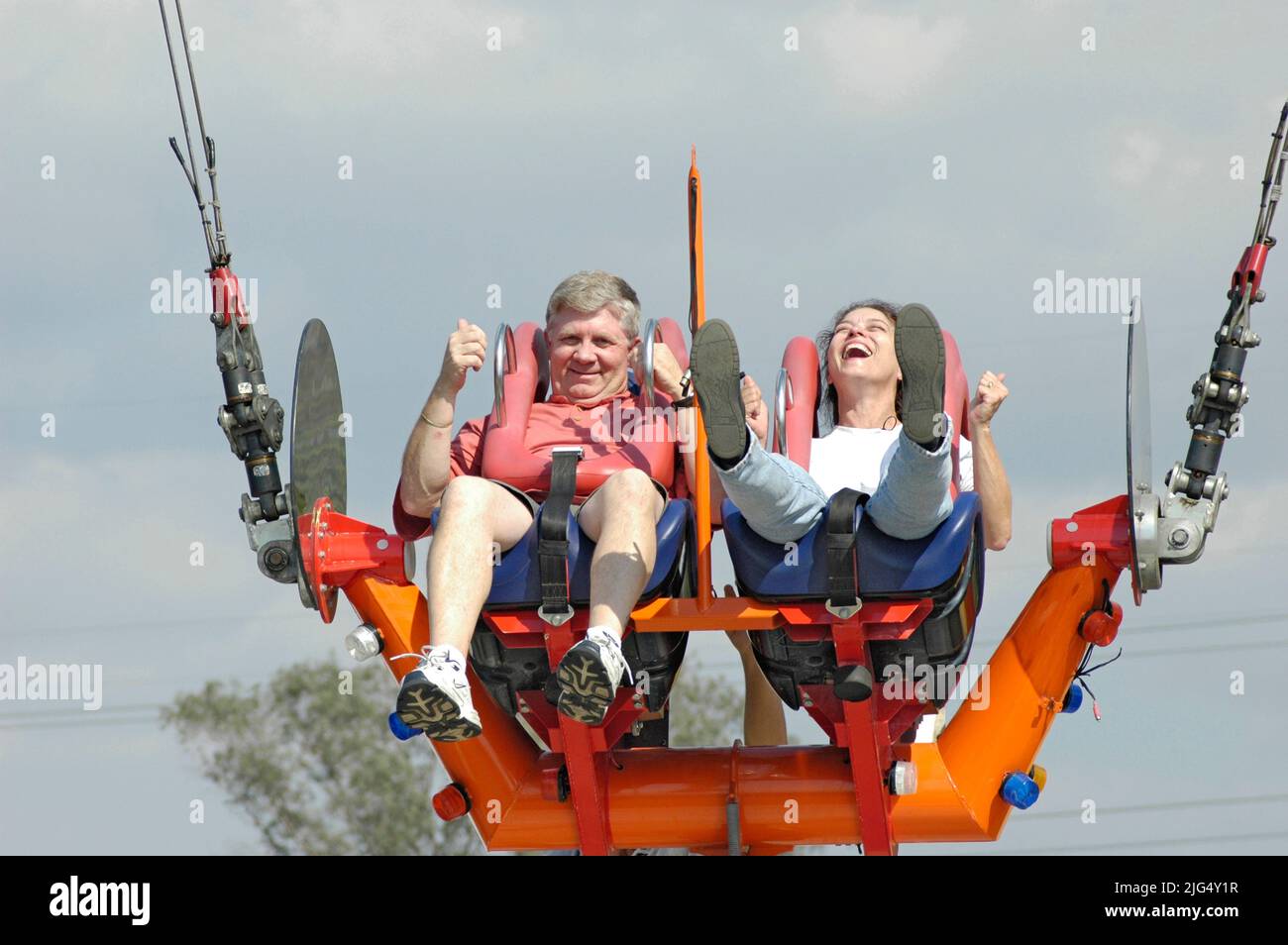 People on local carnival rides for fun during summer vacations at ...