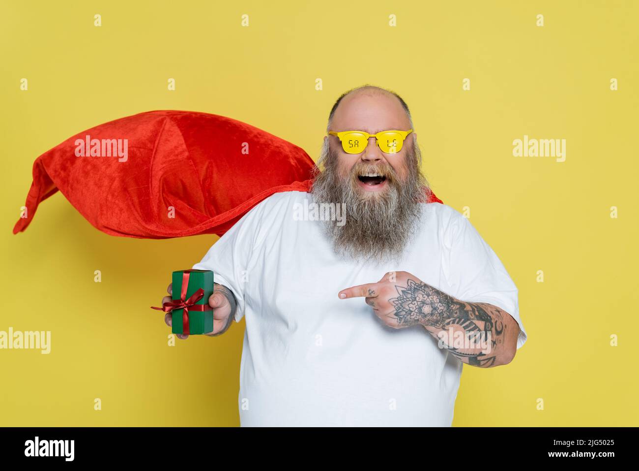 amazed plus size man in glasses with sale lettering and red cloak ...