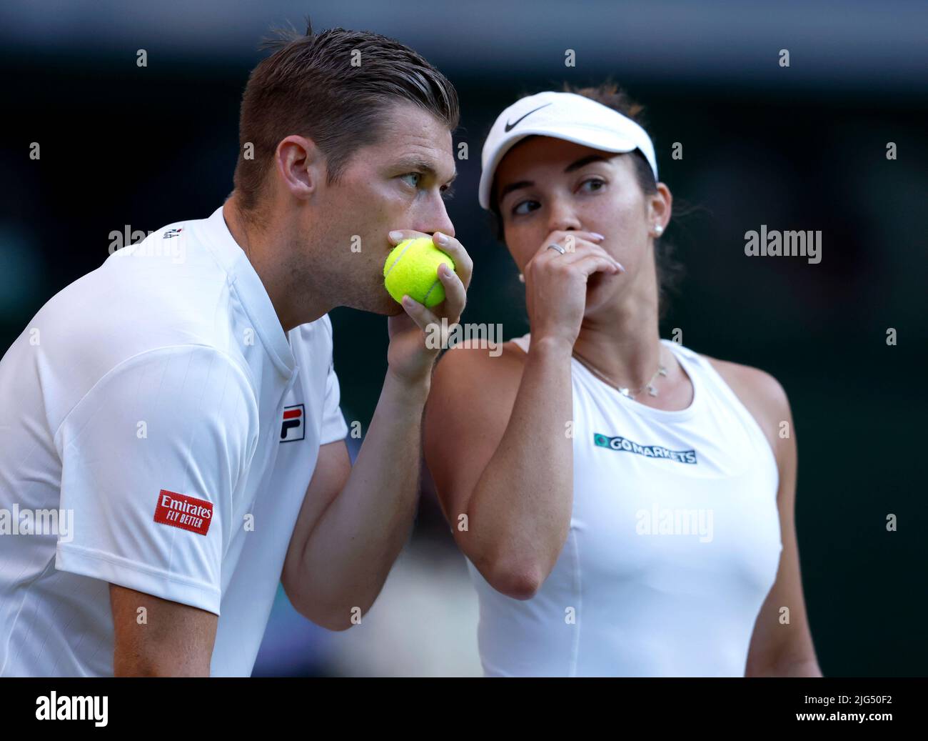Desirae Krawczyk and Neal Skupski speak during their match against ...